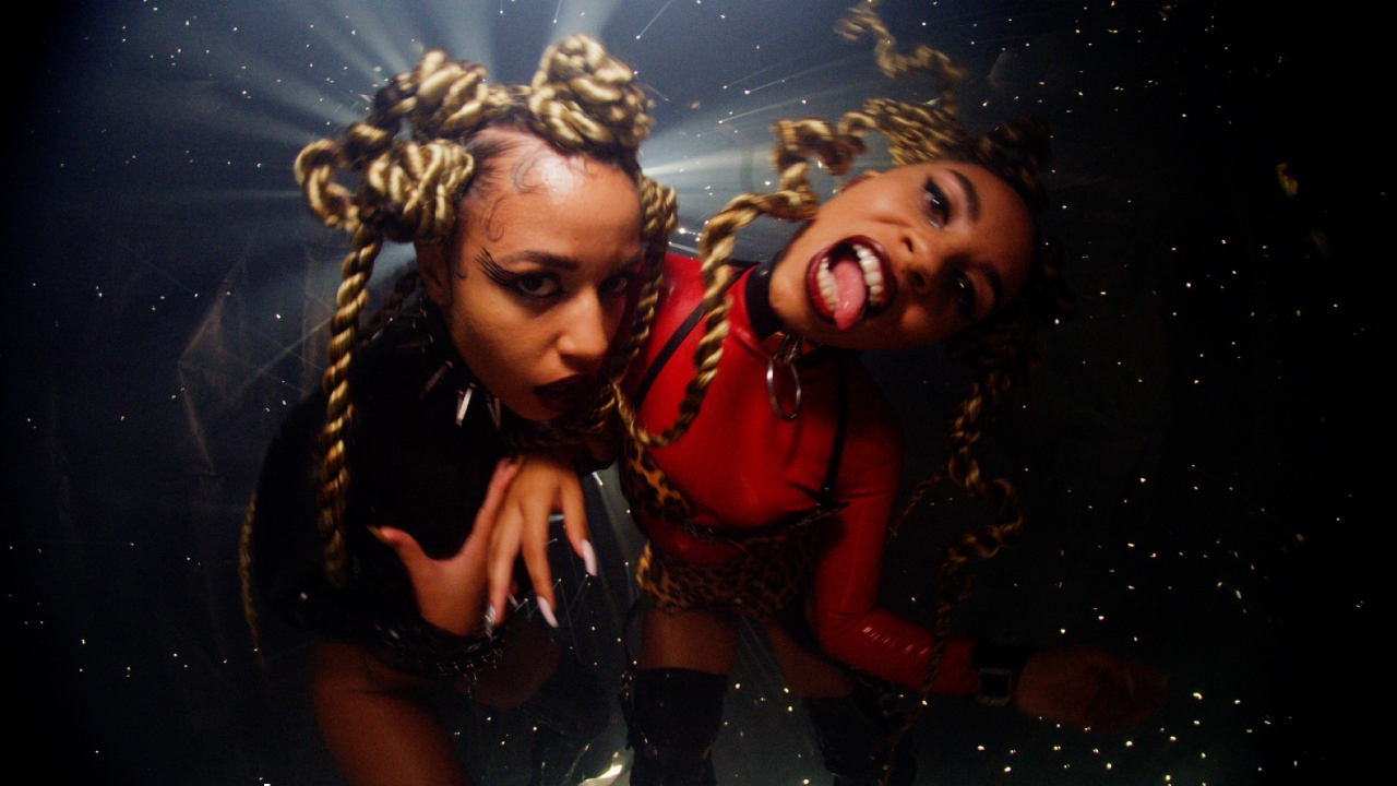 Watch Kinder's Electrifying New Music Video For 'Bus Stop' - Music Feeds