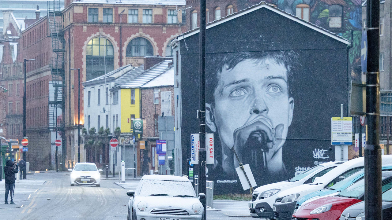 Joy Division's Ian Curtis Mural Restored in Manchester